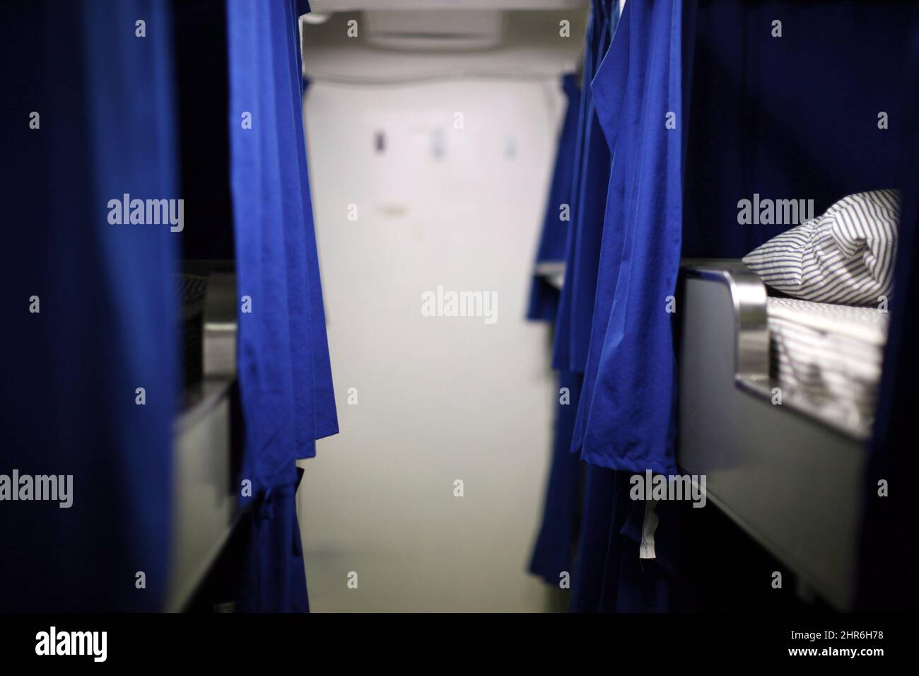 Sleeping quarters aboard the USS Nimitz, a 23 story tall, 1,115 foot ...
