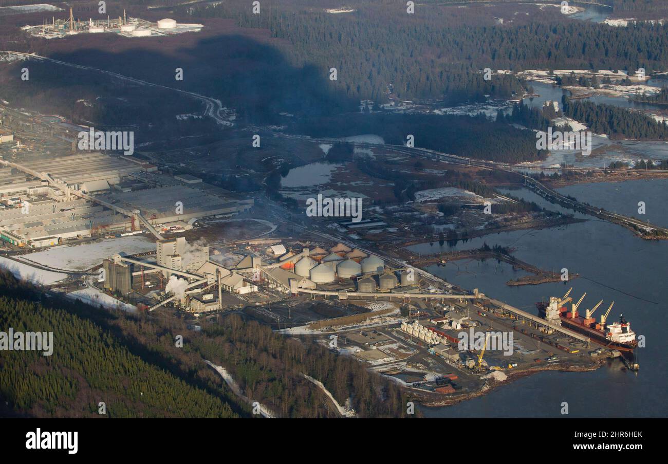 A cargo ship sits docked at Rio Tinto Alcan's Kitimat Smelter on ...