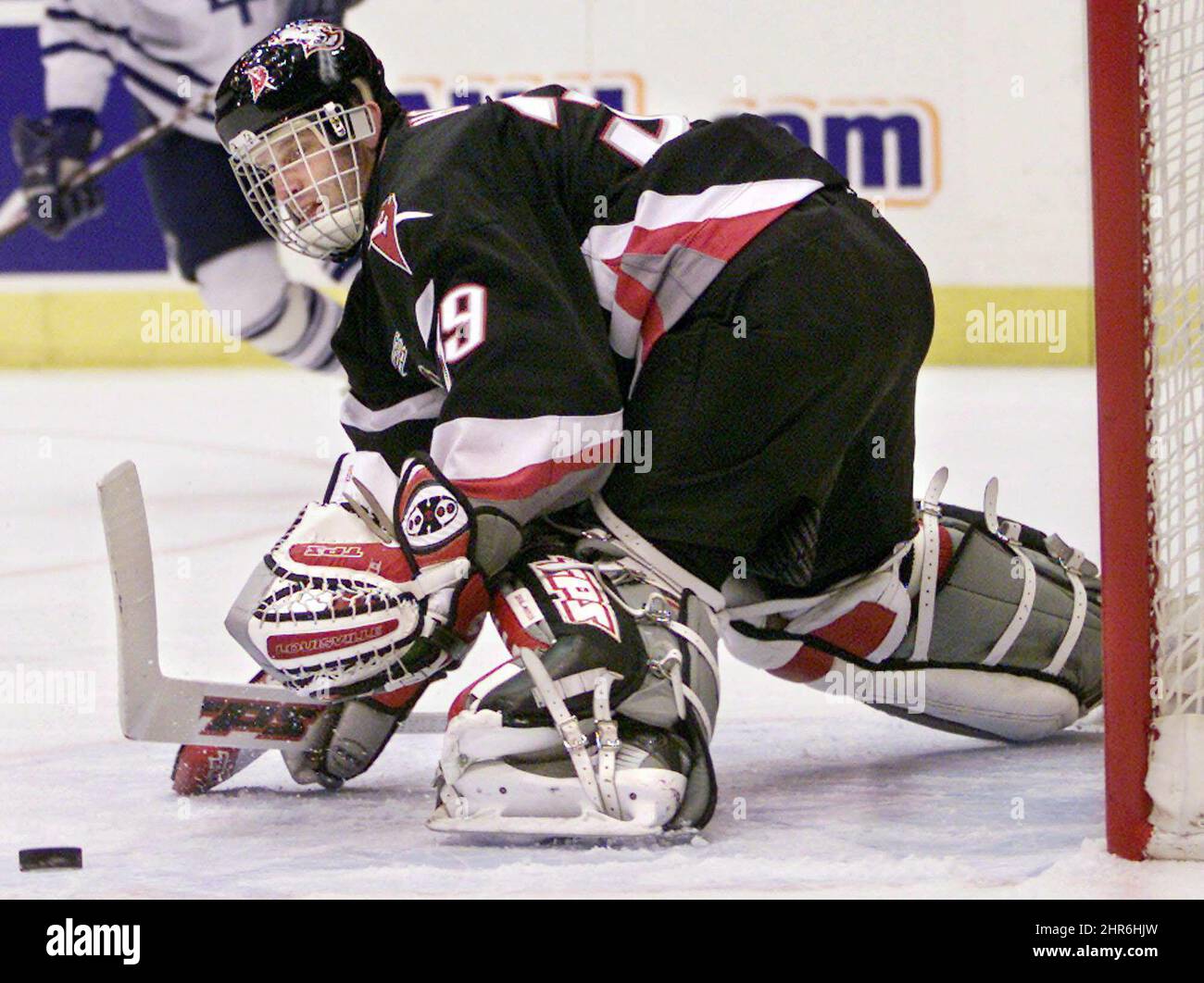 Buffalo Sabres goalie Dominik Hasek tries to get on the puck during ...