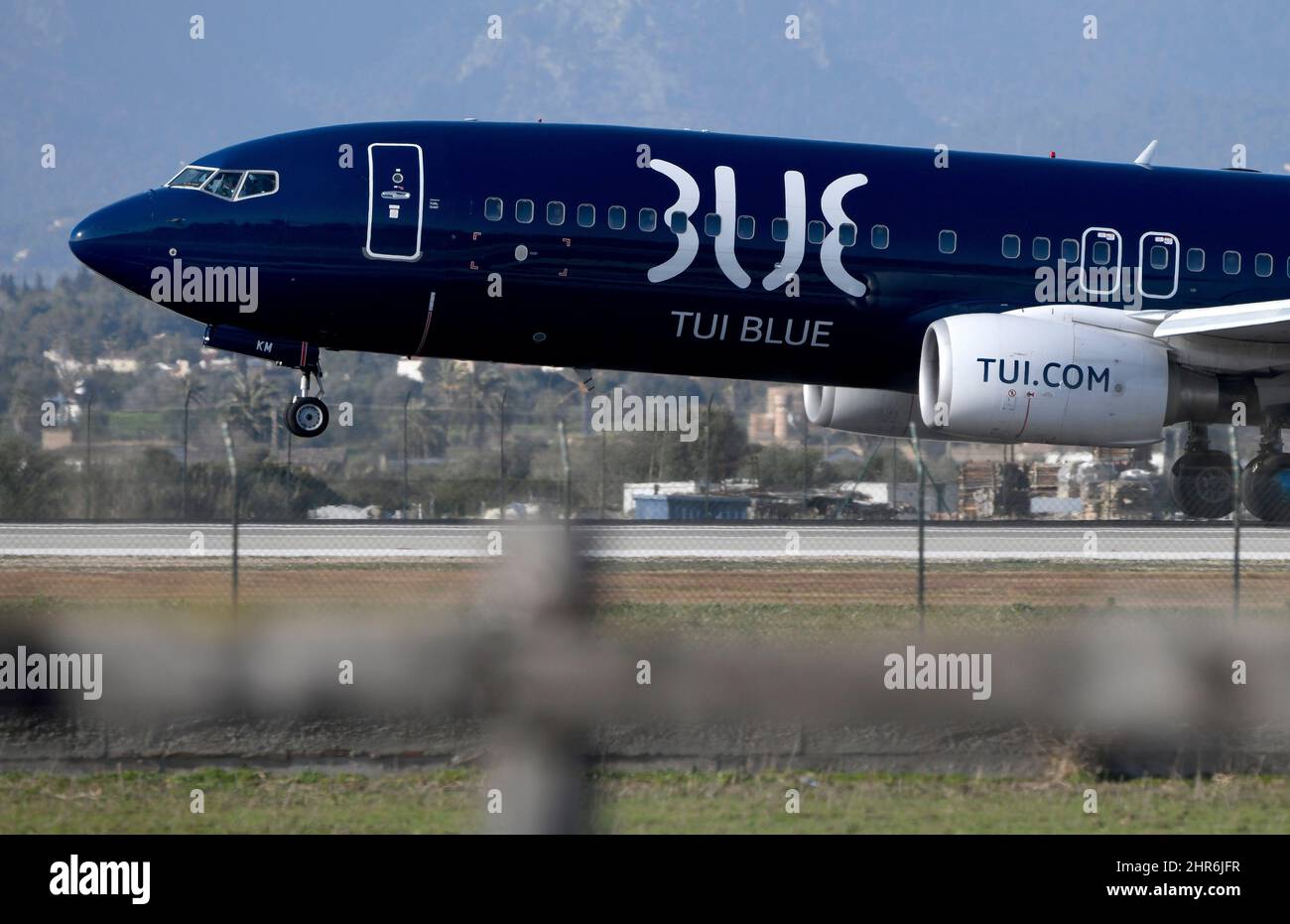 Plane of the company TUI Blue landing at the airport of Palma de ...