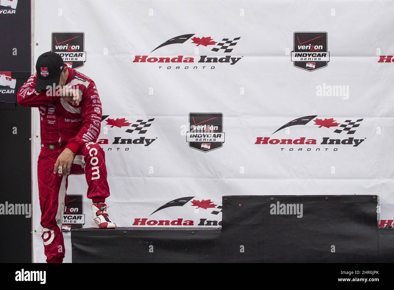 Second place finisher Tony Kanaan, of Brazil, waits for winner Mike ...