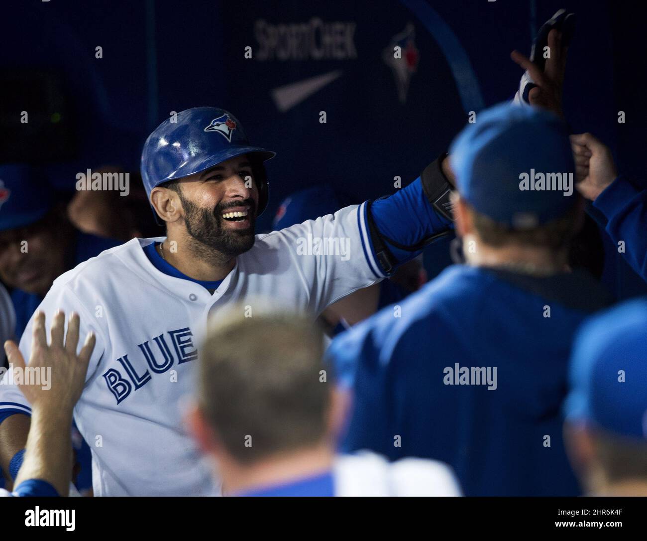 Toronto Blue Jays Jose Bautista, left, celebrates with teammates in the ...