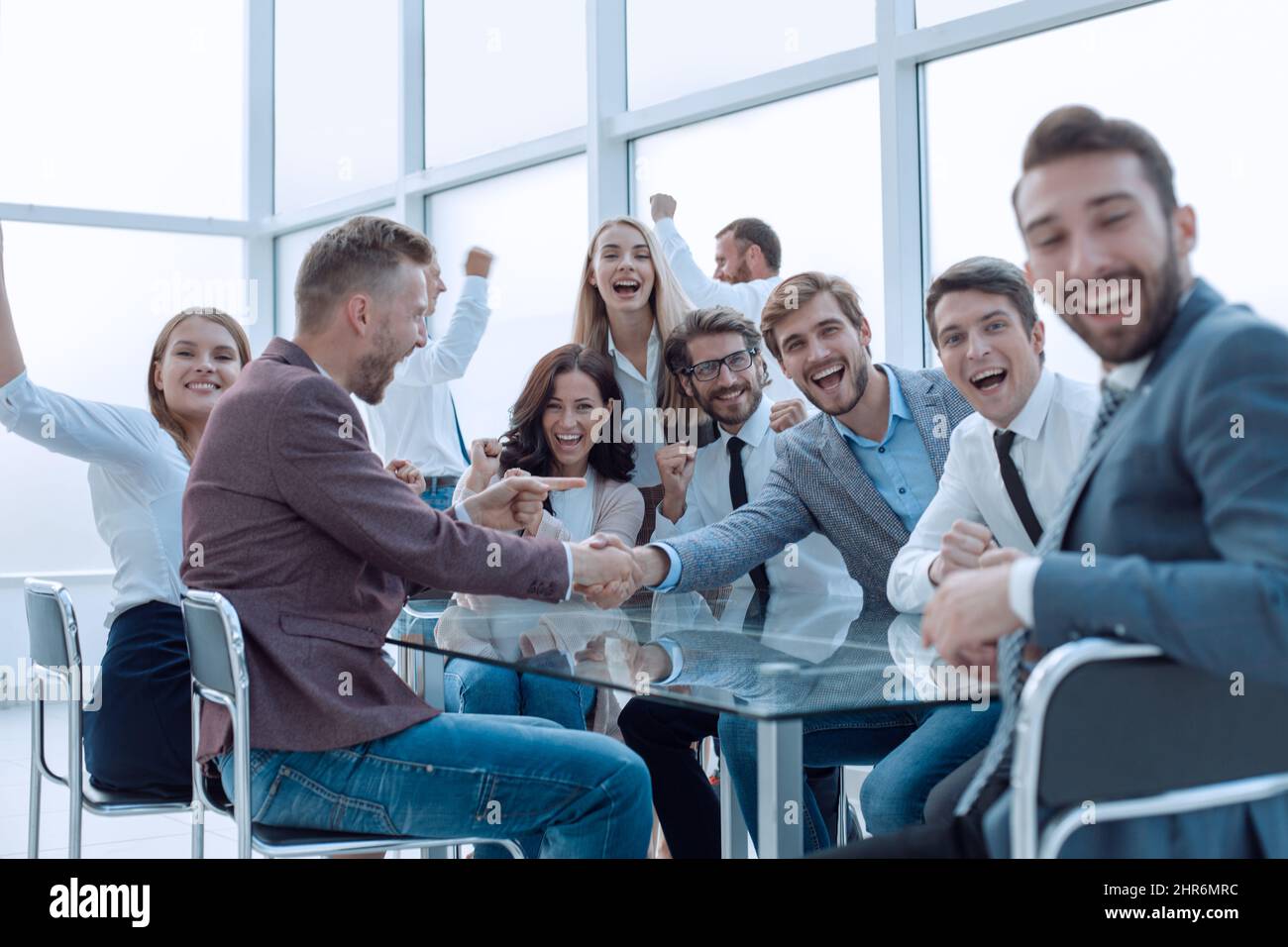 happy business people confirming the transaction with a handshake Stock ...