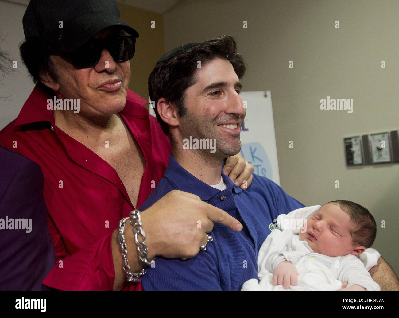 KISS rock star Gene Simmons, left, poses with father Dani Neufeld ...