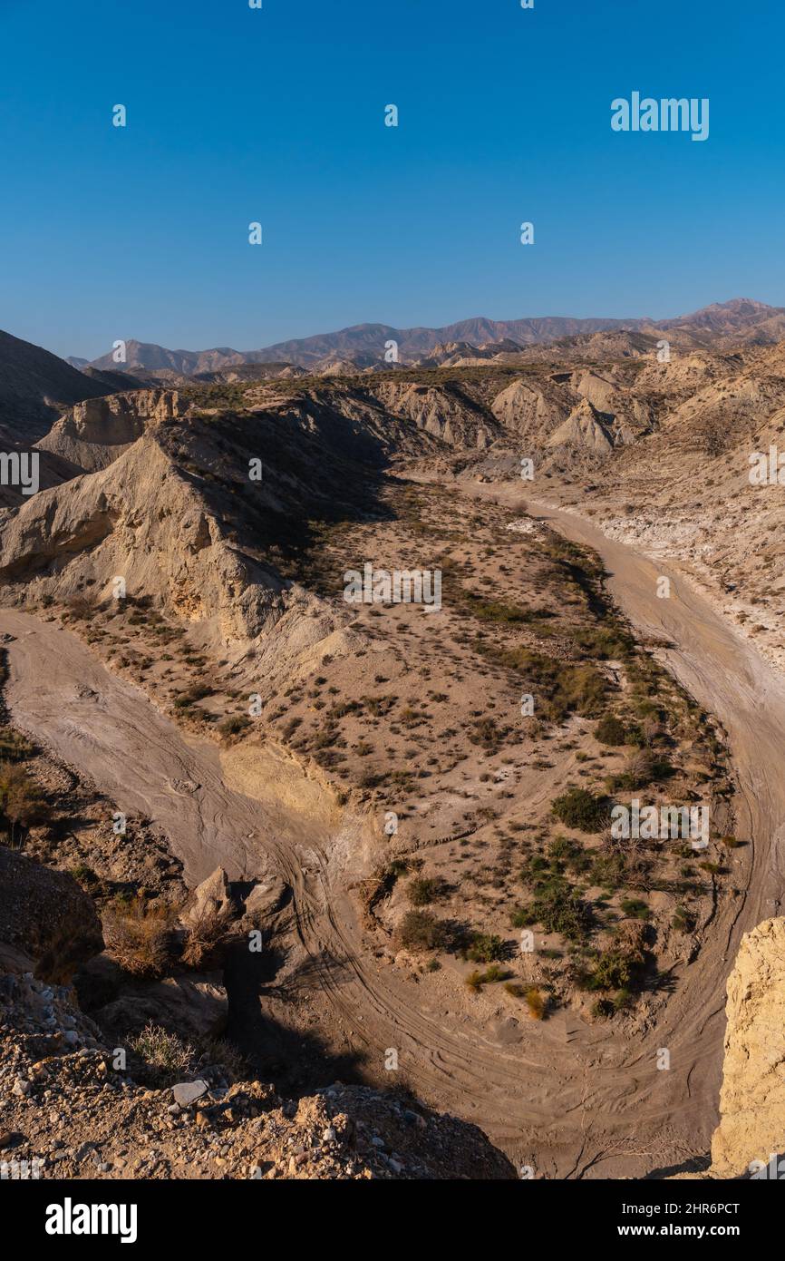 Vertical shot of a curve at the Tabernas desert in the Almeria province ...