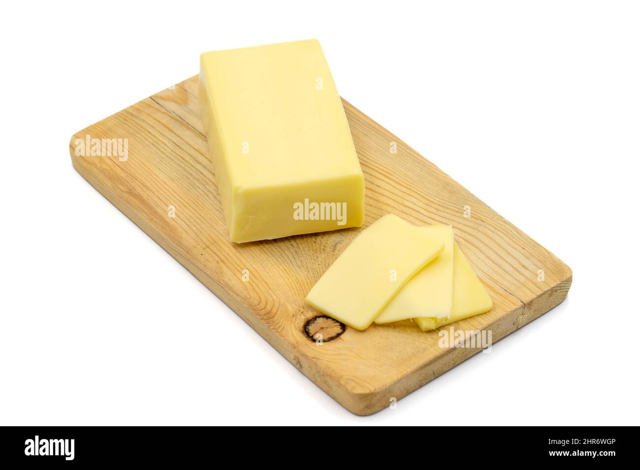 Kashar cheese or kashkaval cheese on white background. Sliced Cheddar ...