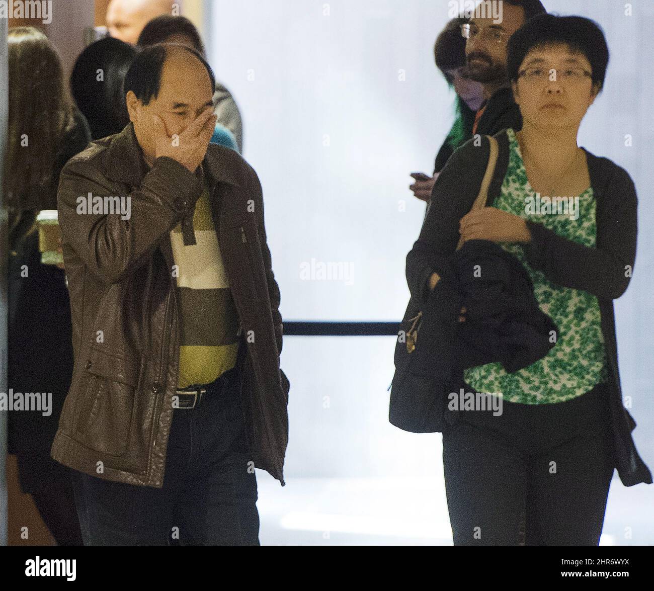 Diran Lin, left, father of victim Jun Lin, and his translator Anna Liu ...