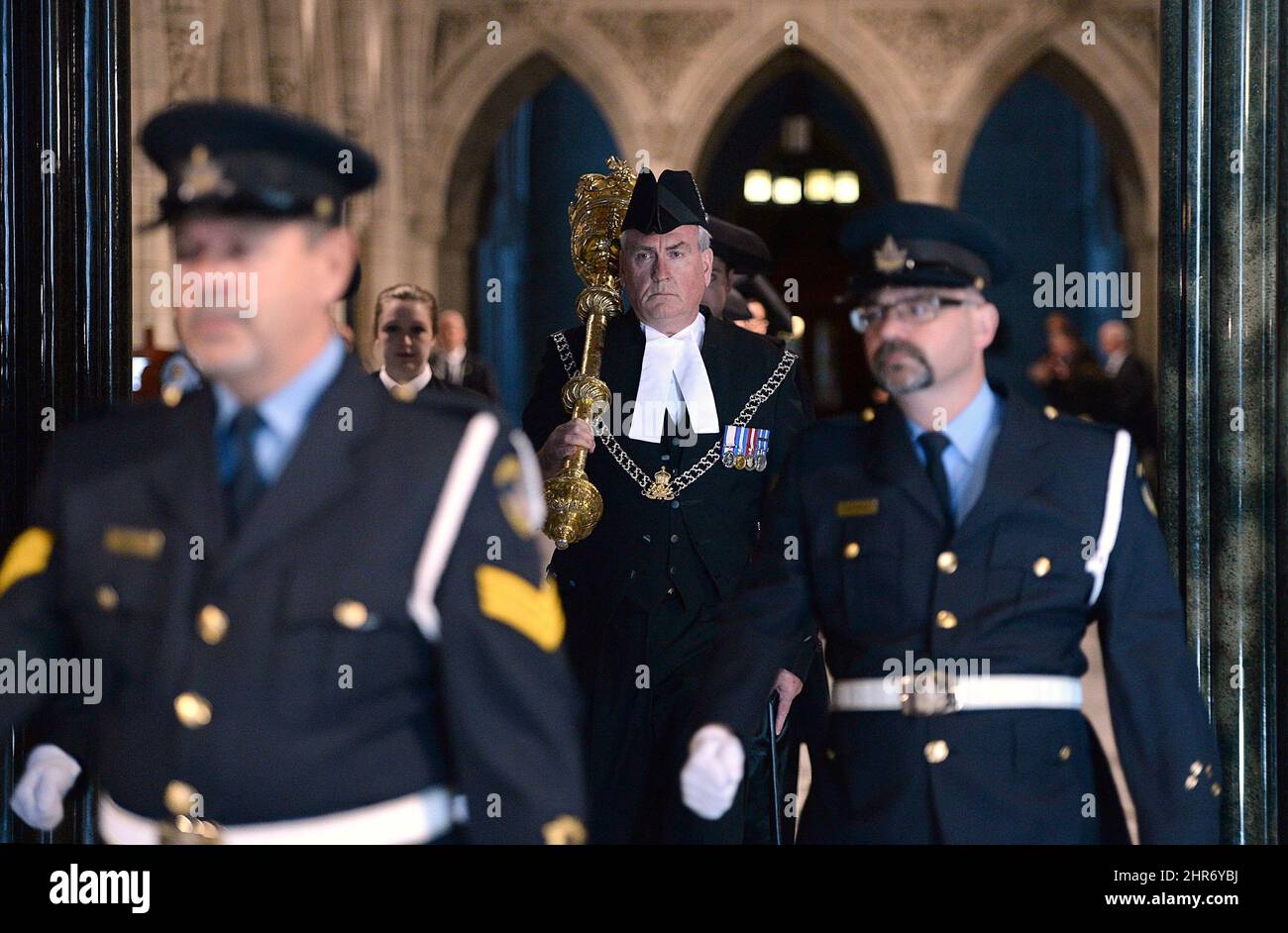 House of Commons Sergeant-at-Arms Kevin Vickers carries the mace during ...