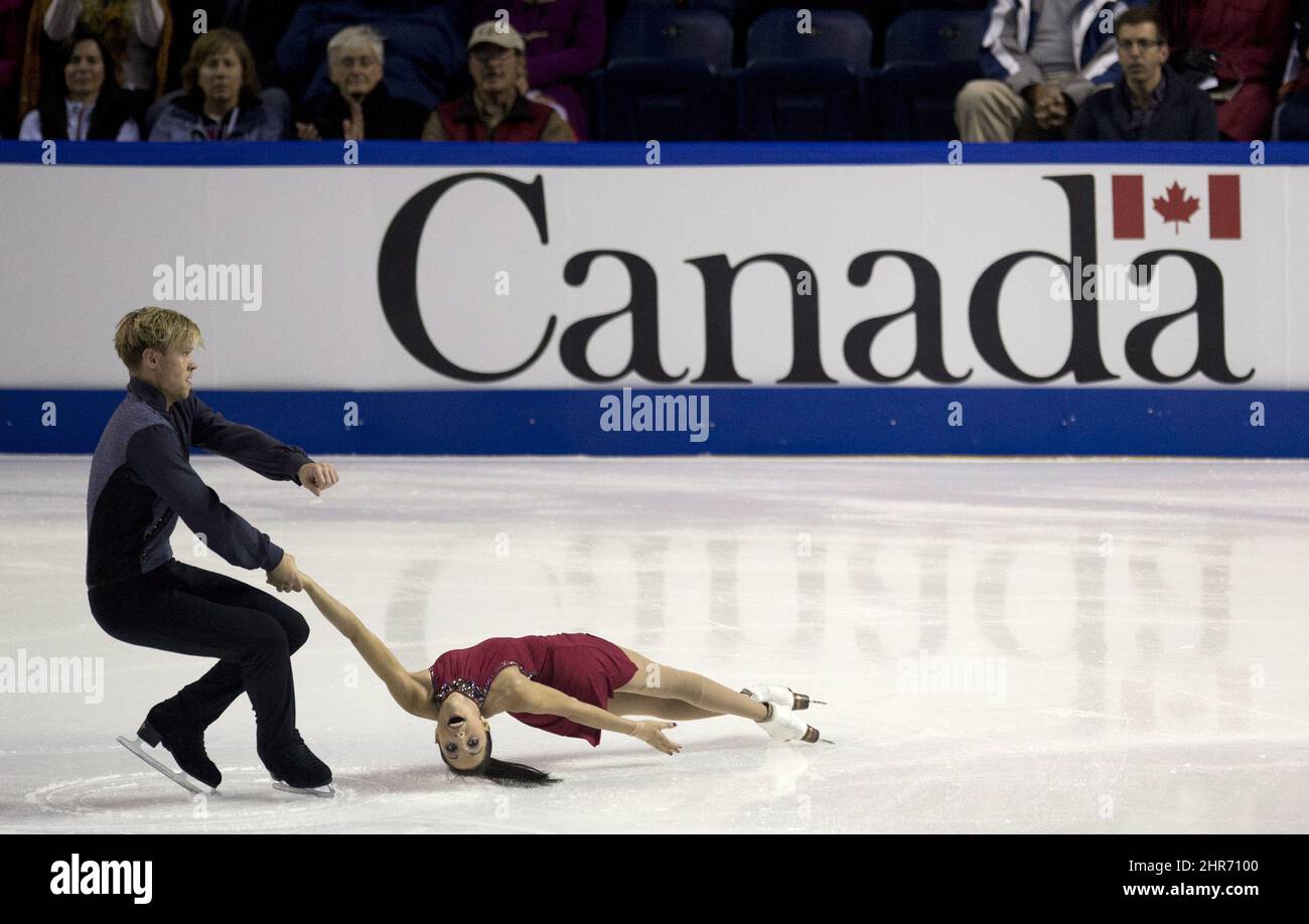 Brittany Jones and Joshua Reagan, of Canada, skate during the pairs ...