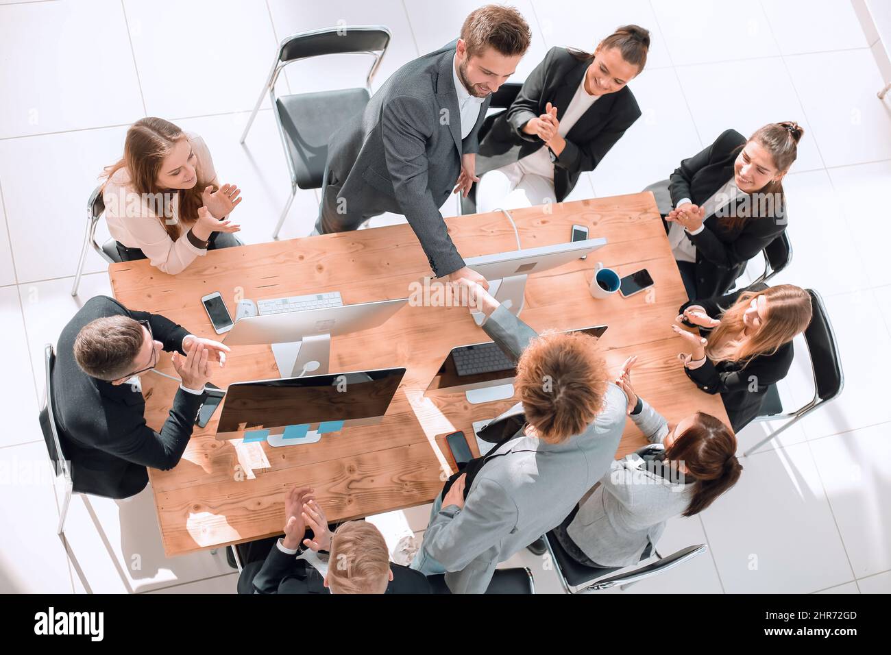 boss shaking hands with the employee during the working meeting Stock ...