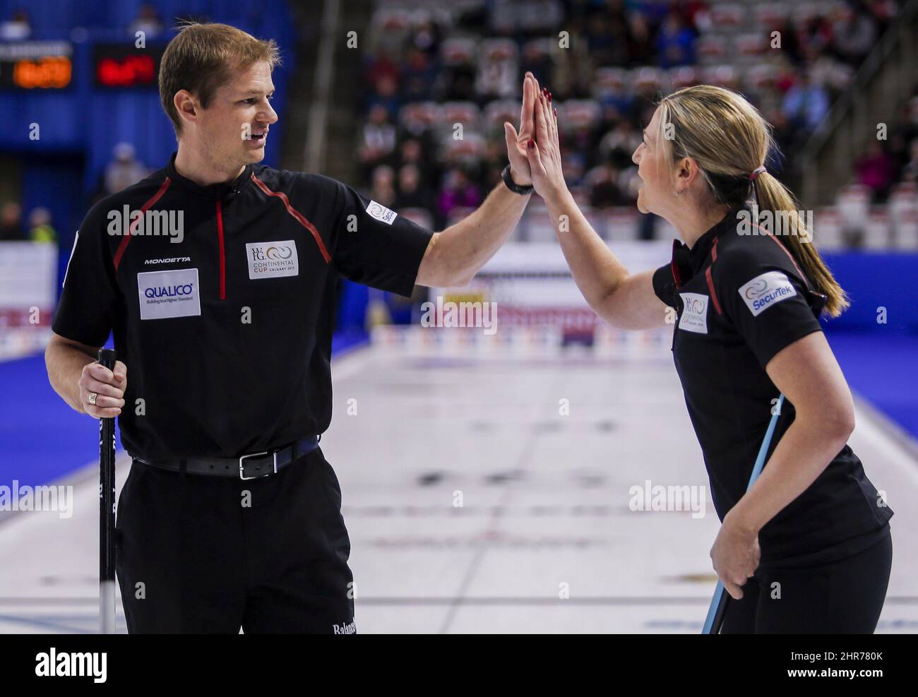 Team Canada's Lori Olson-Johns, left, and Carter Rycroft compete in the ...