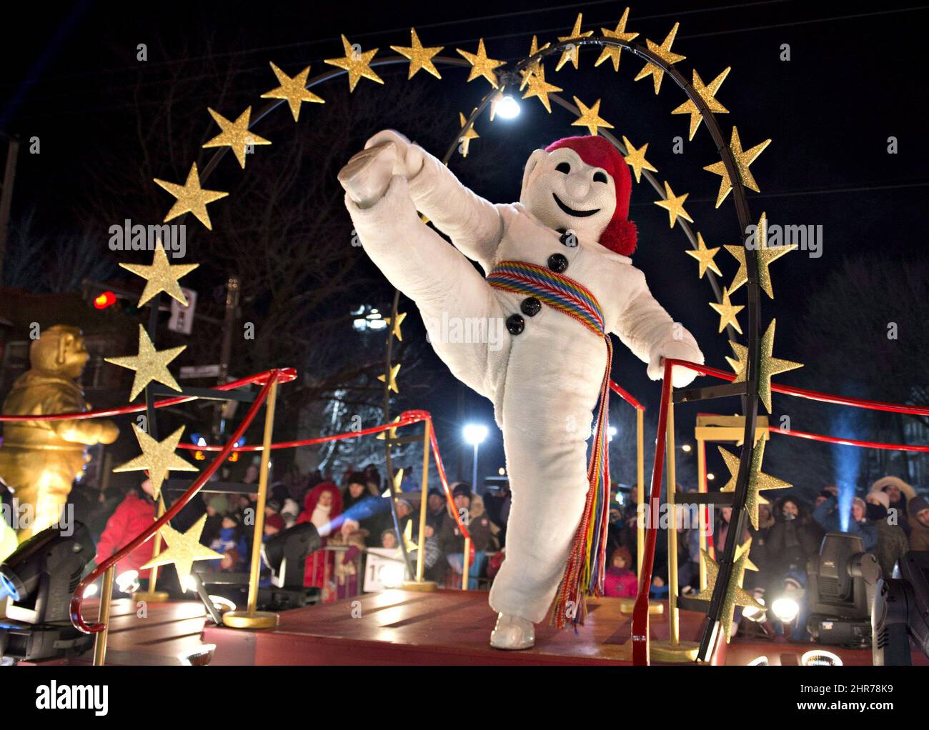 Bonhomme Carnaval raises his leg in a traditional step at the Quebec ...