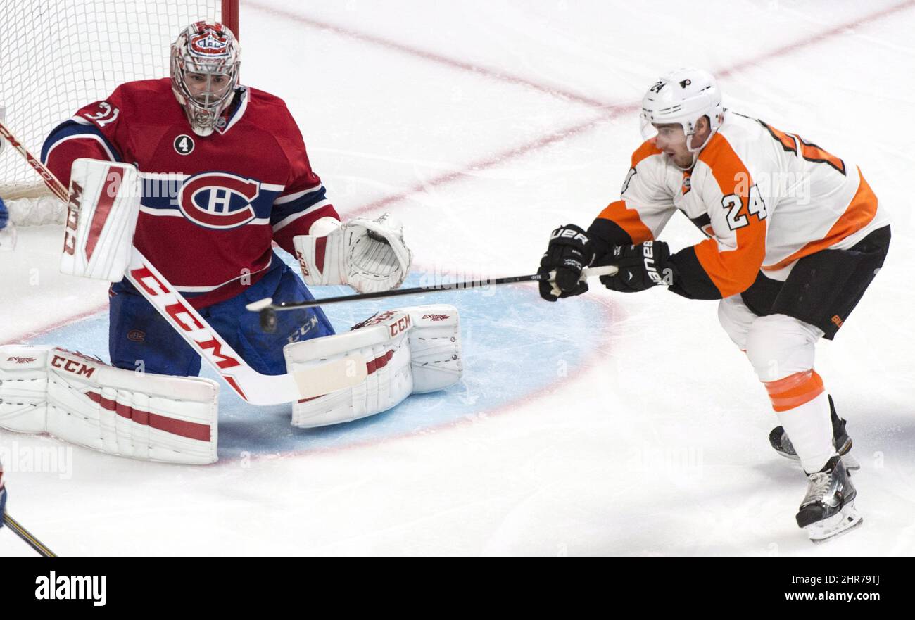 Philadelphia Flyers' Matt Read tries to deflect a shot past Montreal ...