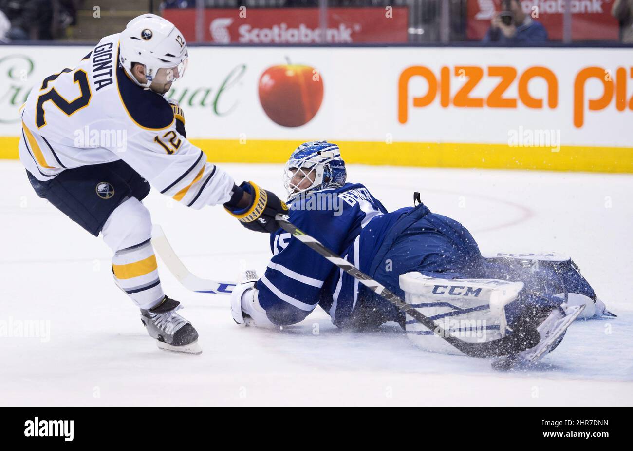 Toronto Maple Leafs goaltender Jonathan Bernier makes a save on Buffalo ...