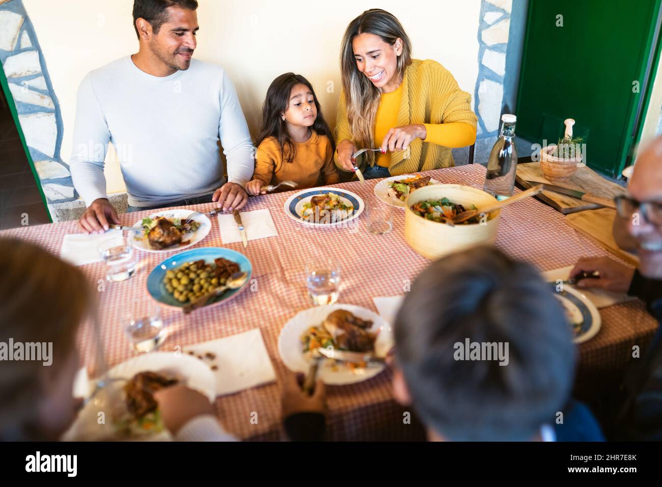 Hispanic Family Eating Dinner