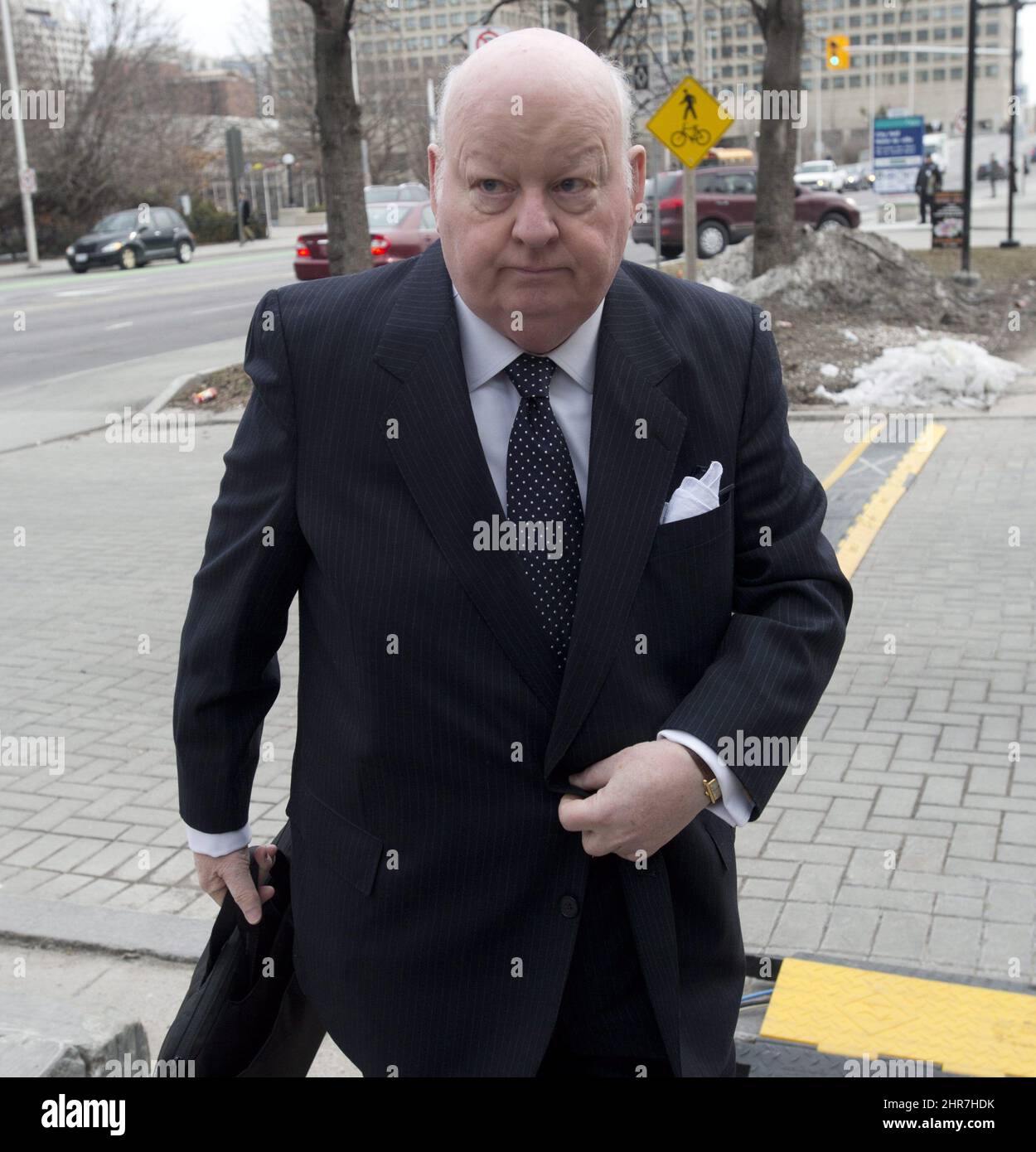 Suspended senator Mike Duffy arrives at the courthouse for second day ...