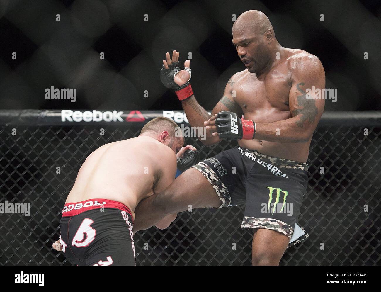Rampage Jackson, from the United States, right, lands a kick to the ...