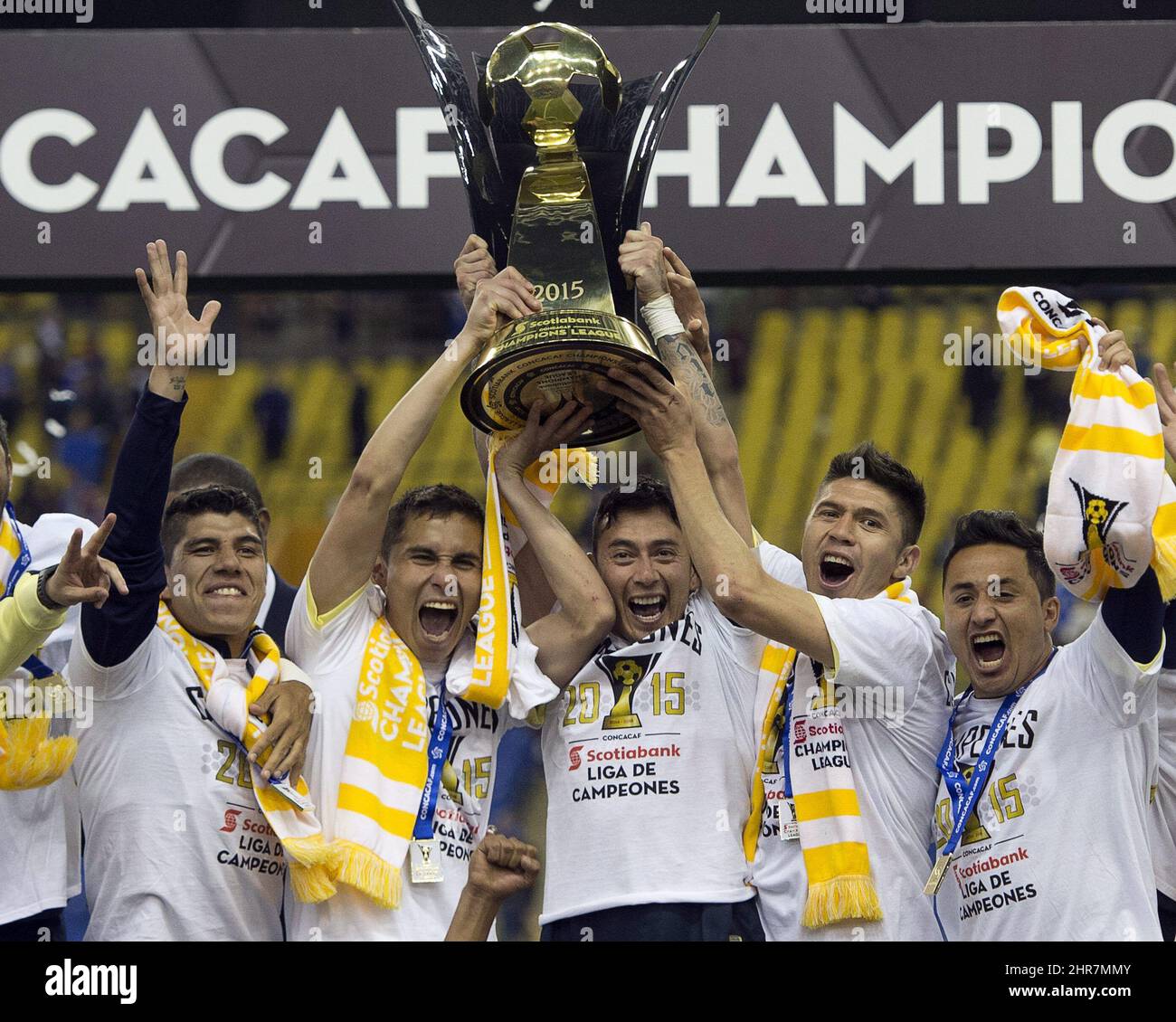 Club America players raise the championship trophy after defeating the ...