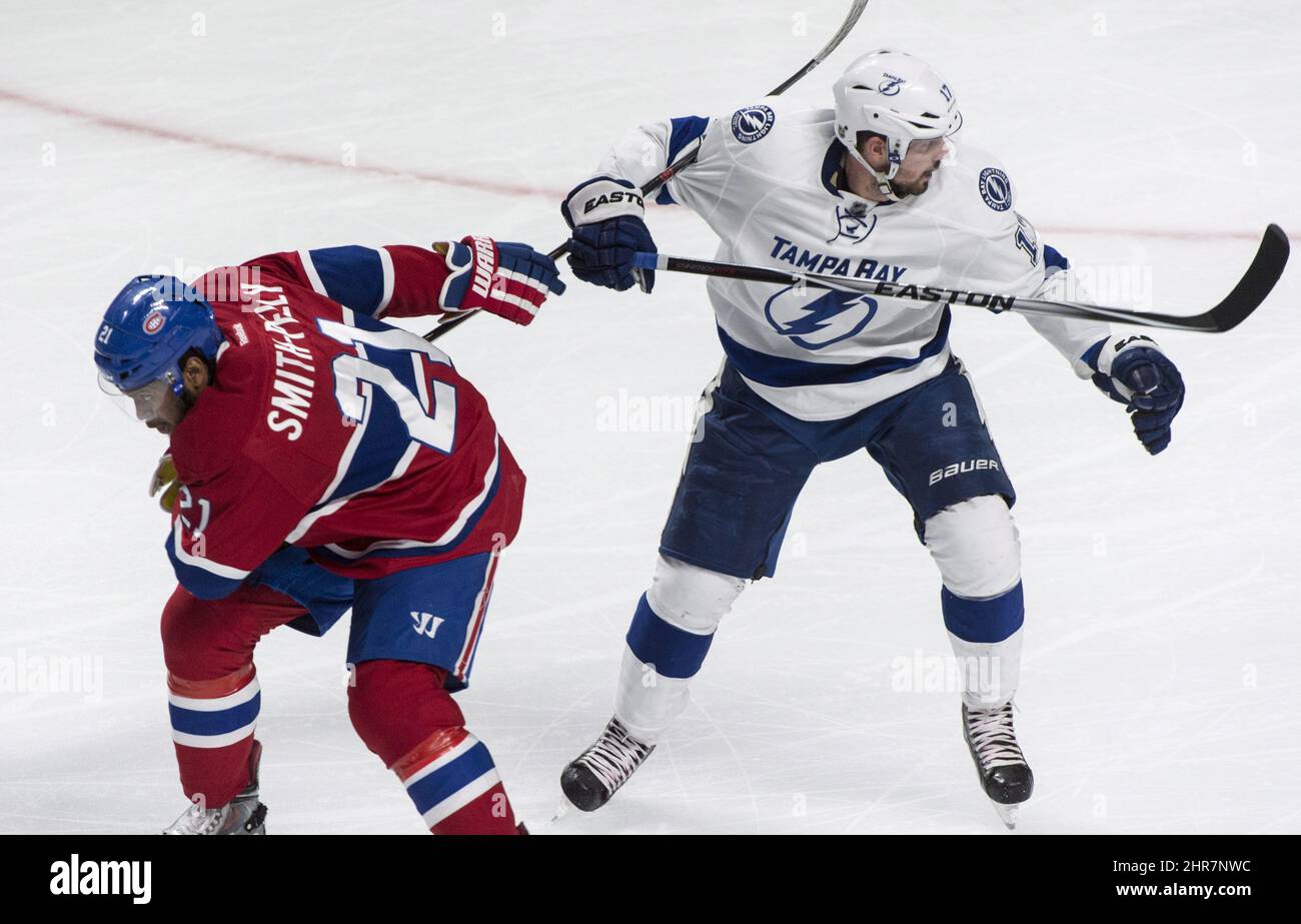 Tampa Bay Lightning's Alex Killorn holds Montreal Canadiens' Devante ...