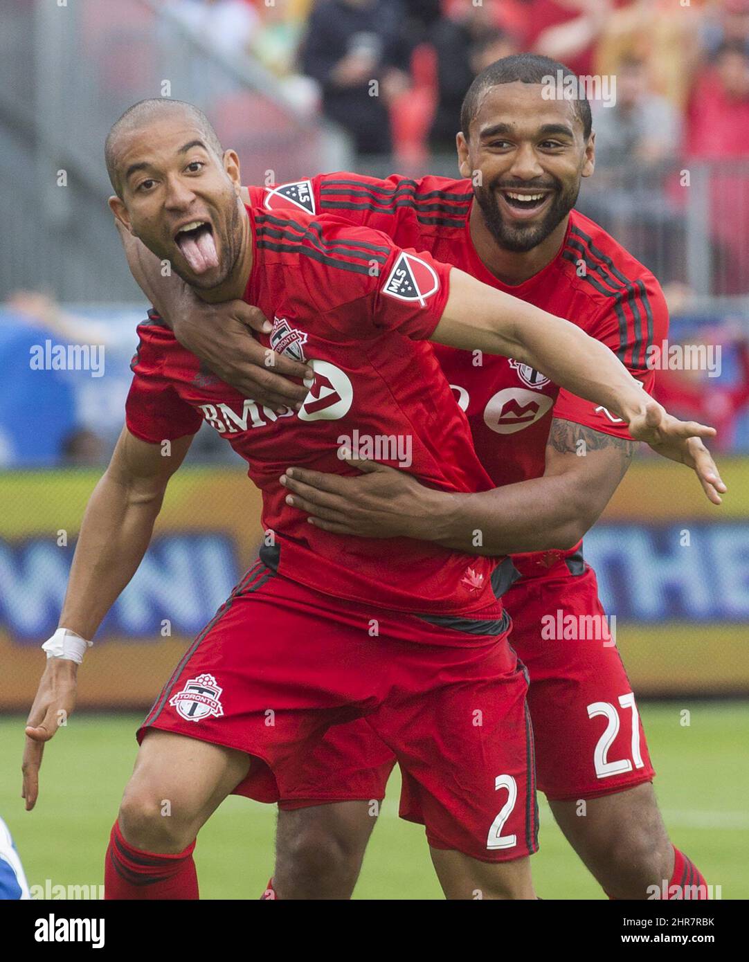 Toronto FC's Justin Morrow celebrates his goal with Luke Moore, right ...