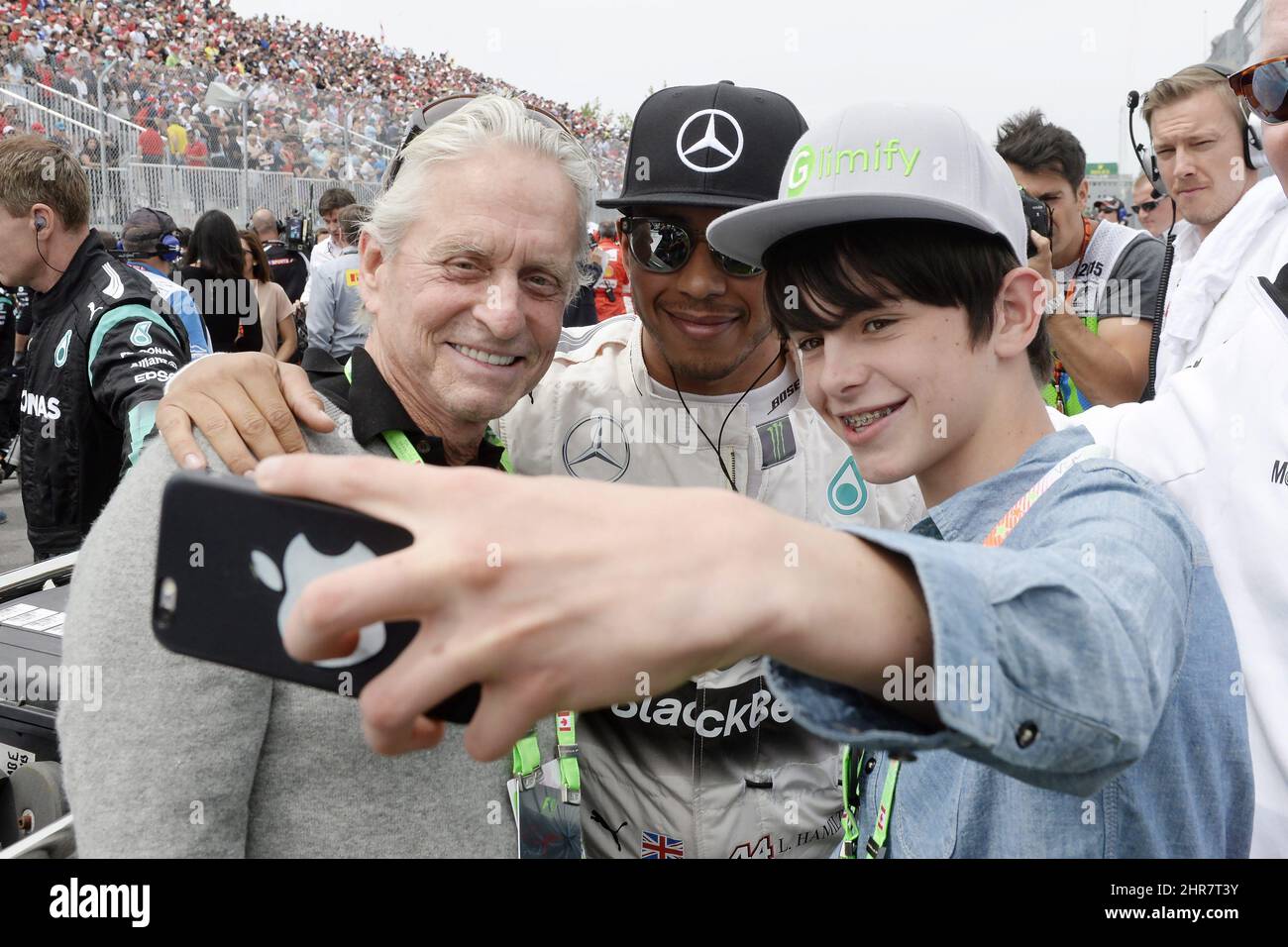 Michael Douglas, left, and his son Dylan, right, take a photo with ...