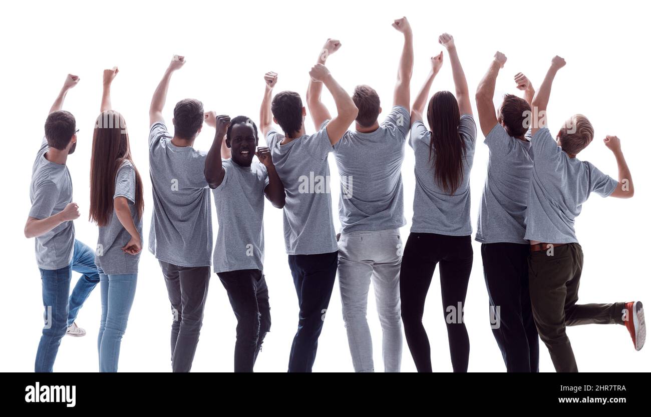 rear view. a group of happy young people looking forward Stock Photo ...