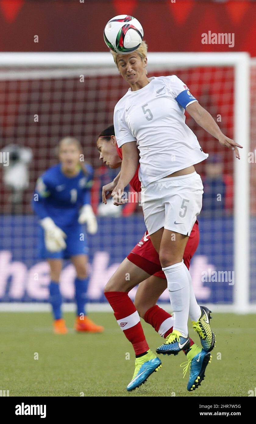 New Zealand's Abby Erceg (5) goes up for a header as Canada's Christine ...