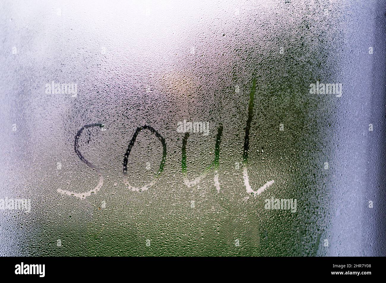 Foggy glass on a window with written finger word Soul. Concept photo ...