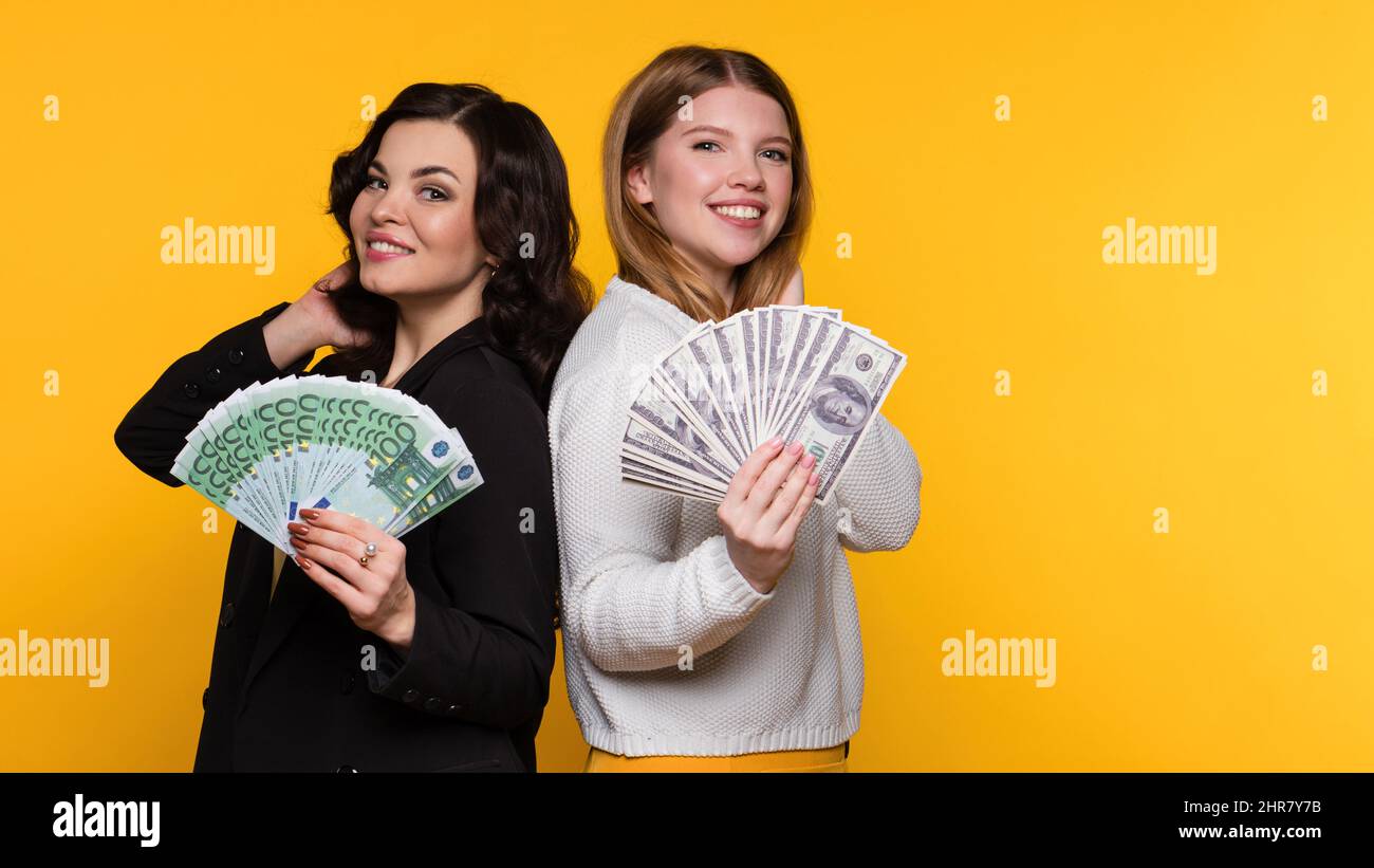 Two Rich Girlfriends Rejoicing Win While Holding Fans of Cash Money ...