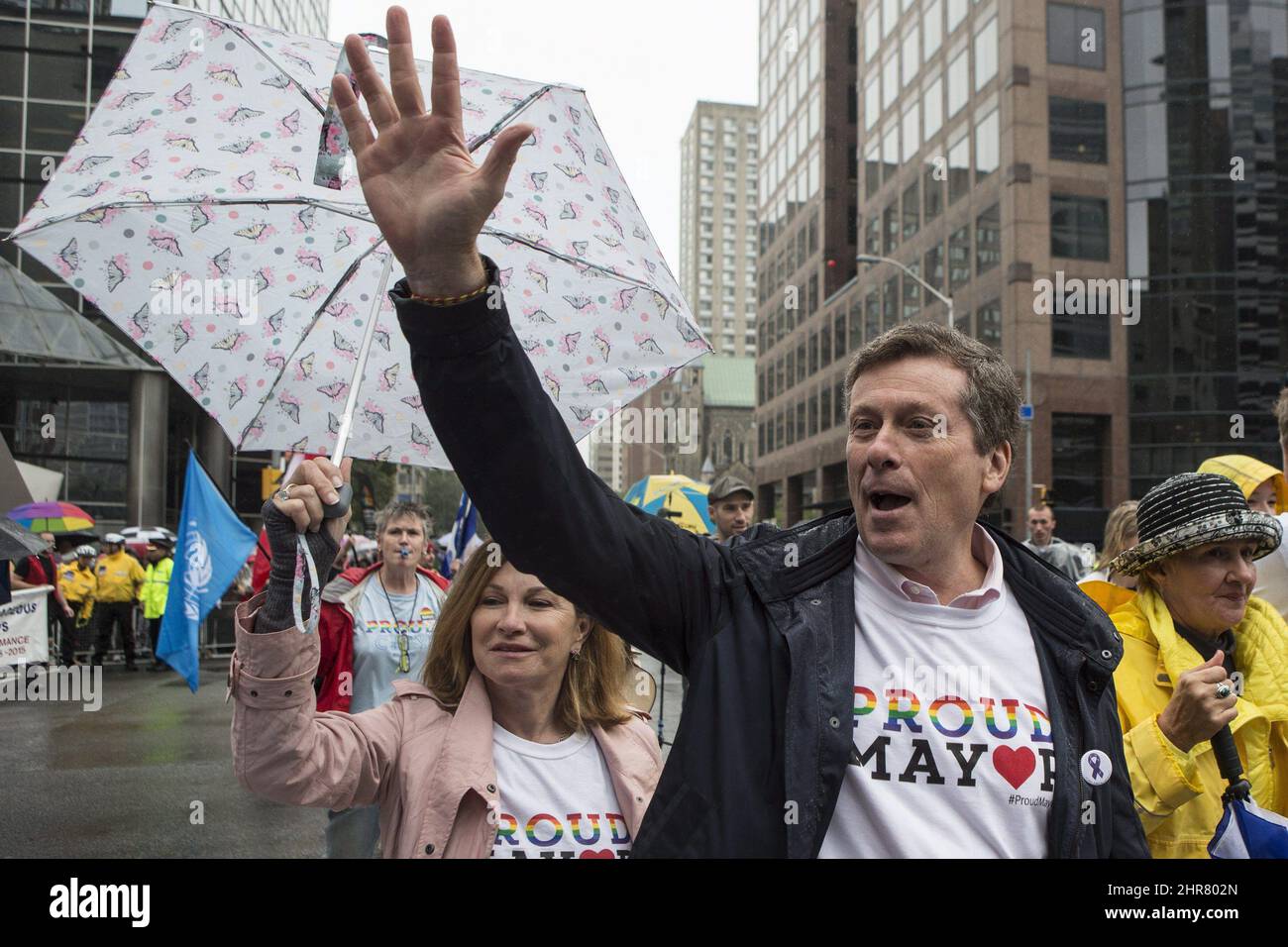 Toronto Mayor John Tory walks the route with his wife Barbara Hackett ...