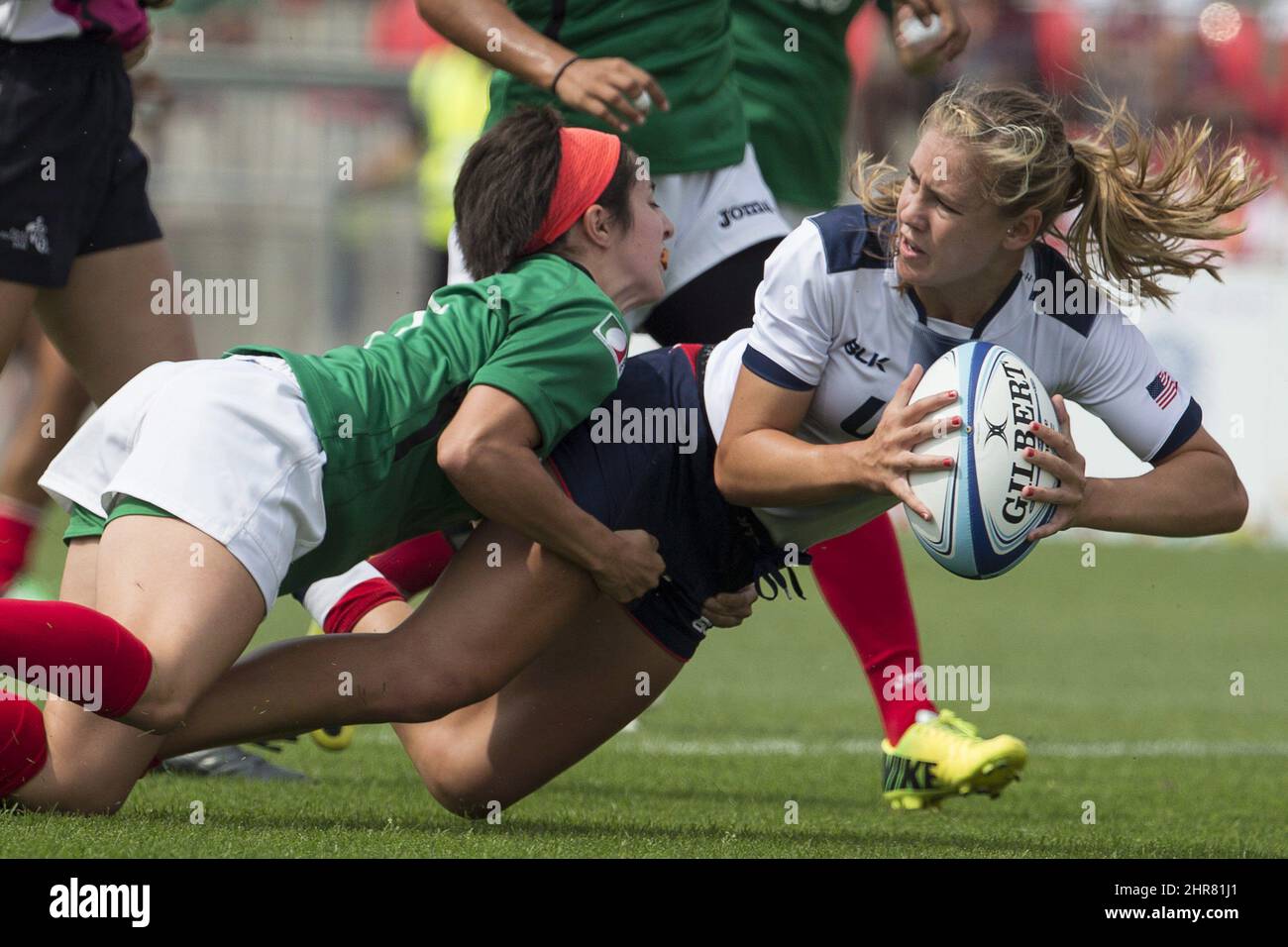 USA's Richelle Stephens (right) turns to feed the ball after being ...