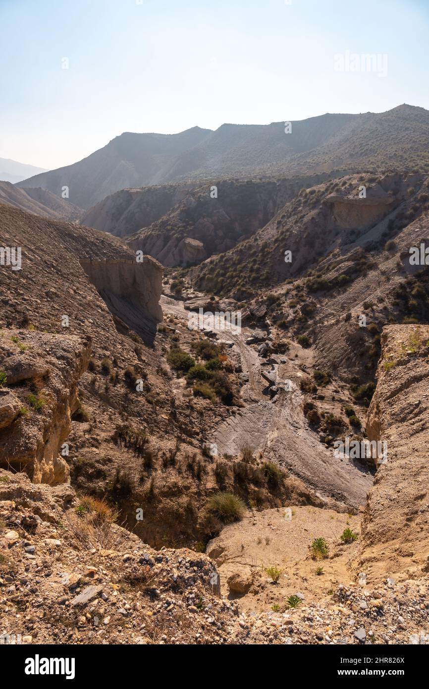 Vertical shot of a curve at the Tabernas desert in the Almeria province ...