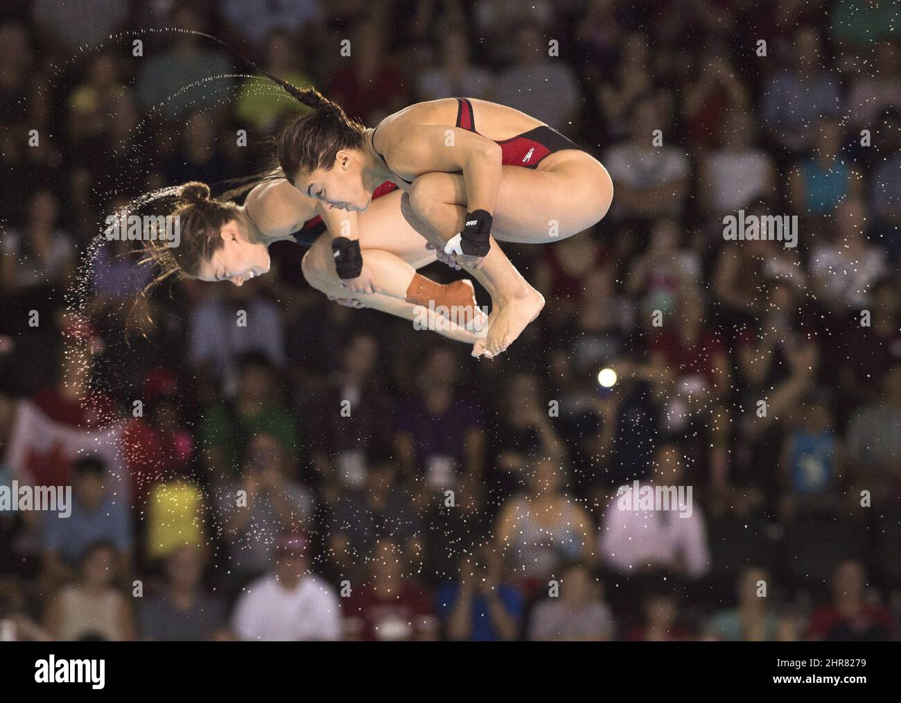 Canada's Meaghan Benfeito, front, and Roseline Filion compete in the ...