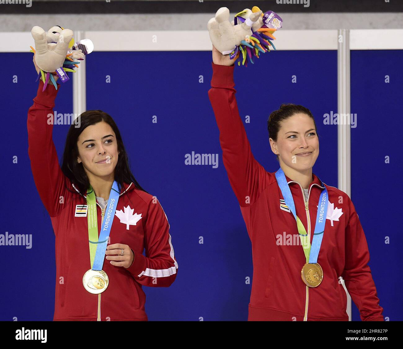 Canada's Meaghan Benfeito, left, and Roseline Filion are presented with ...