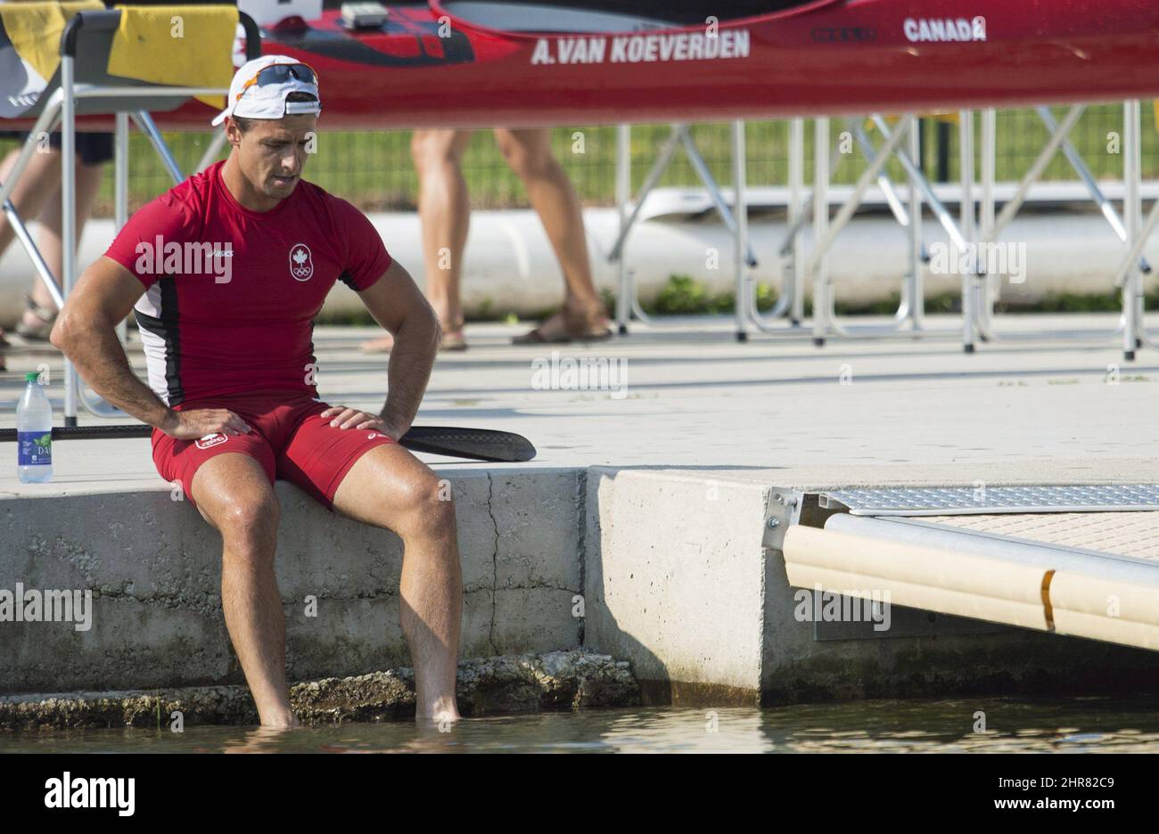 Adam van Koeverden sits on a dock after placing third and winning a ...