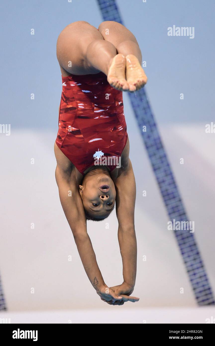 Jennifer Abel of Canada performs in the womens' three-meter springboard ...