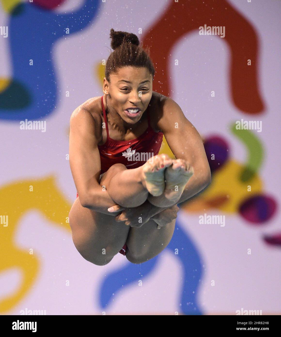 Jennifer Abel of Canada performs in the womens' three-meter springboard ...