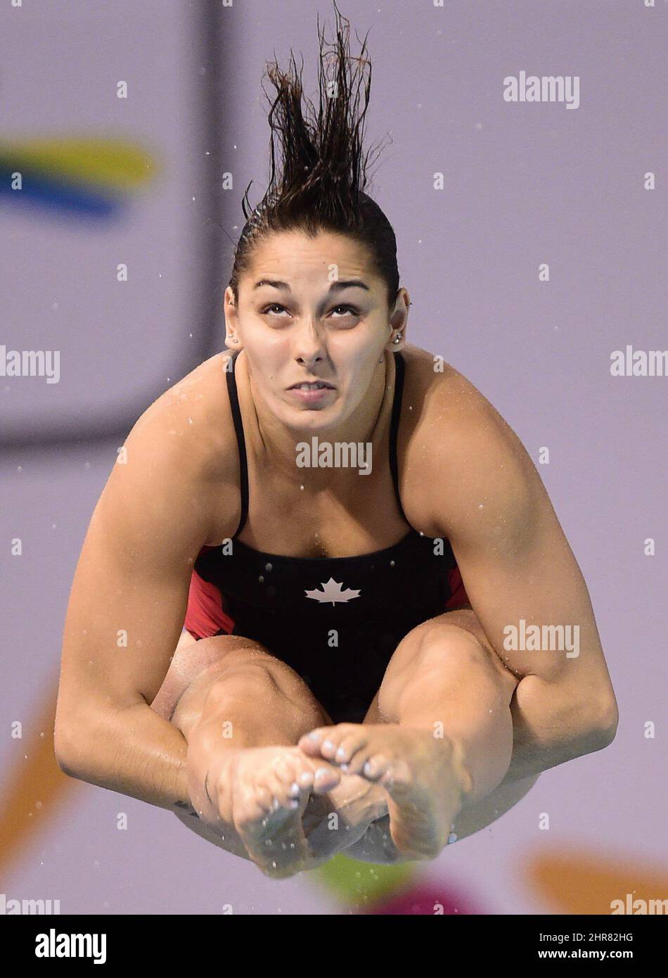 Pamela Ware of Canada performs in the womens' three-meter springboard ...