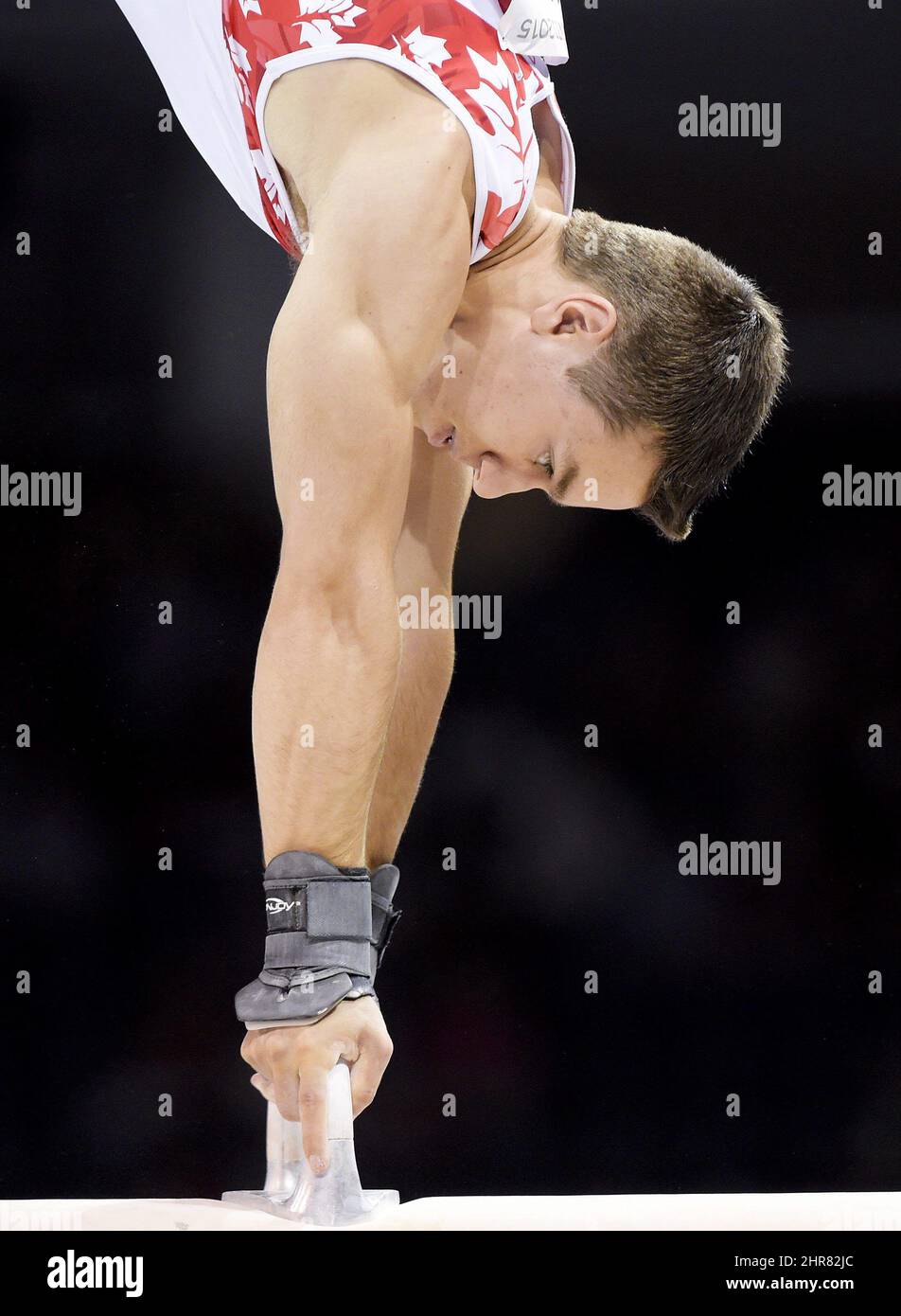 Canada's Rene Cournoyer competes on the pommel horse at the men's all ...