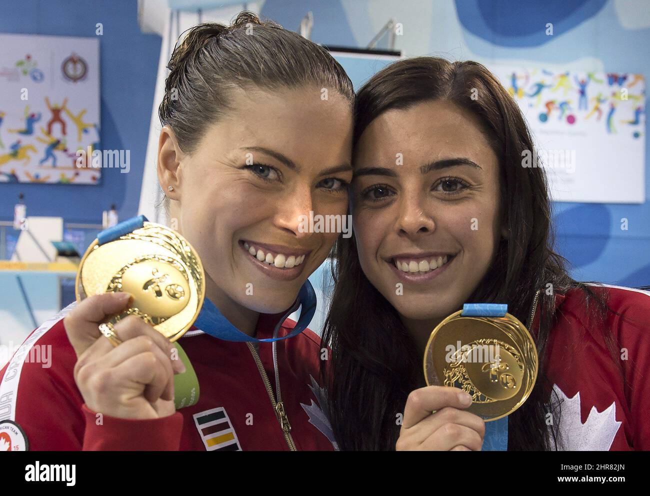 Canada's Meaghan Benfeito, right, and Roseline Filion show off their ...