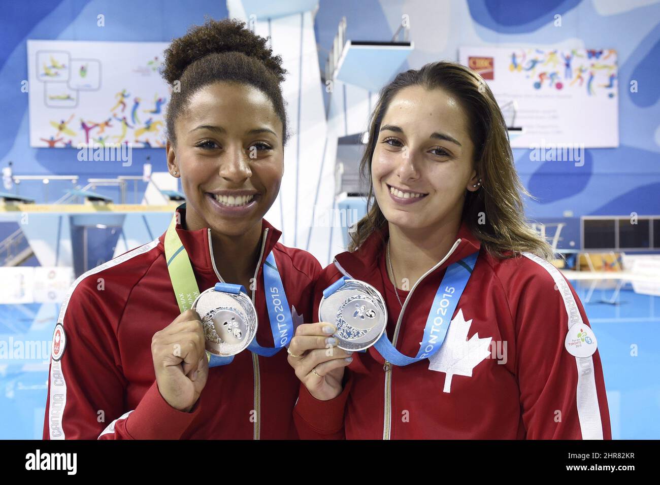 Jennifer Abel, left, and Pamela Ware show off their silver medals in ...