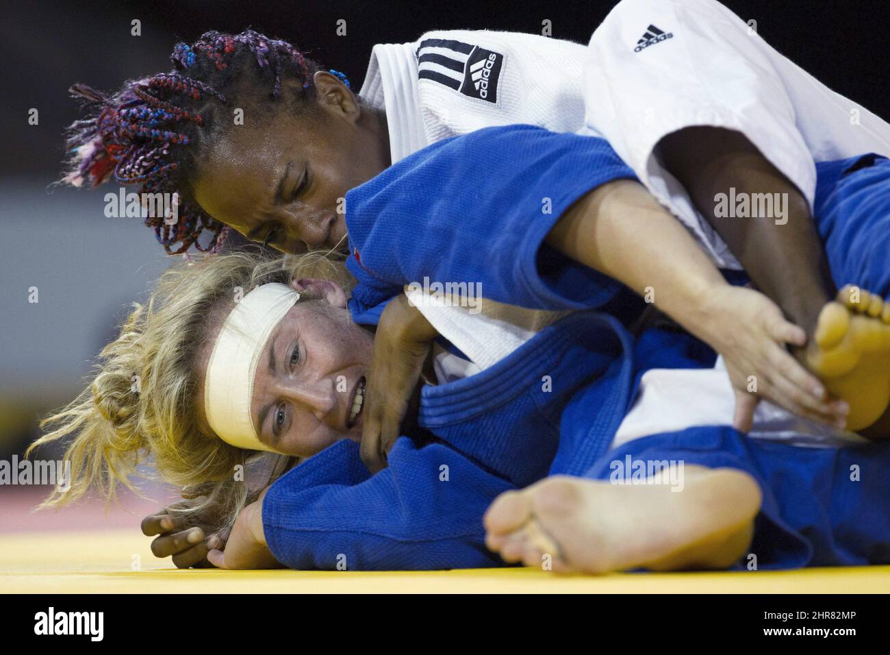 United States' Hannah Martin (bottom) competes against Cuba's Maylin ...