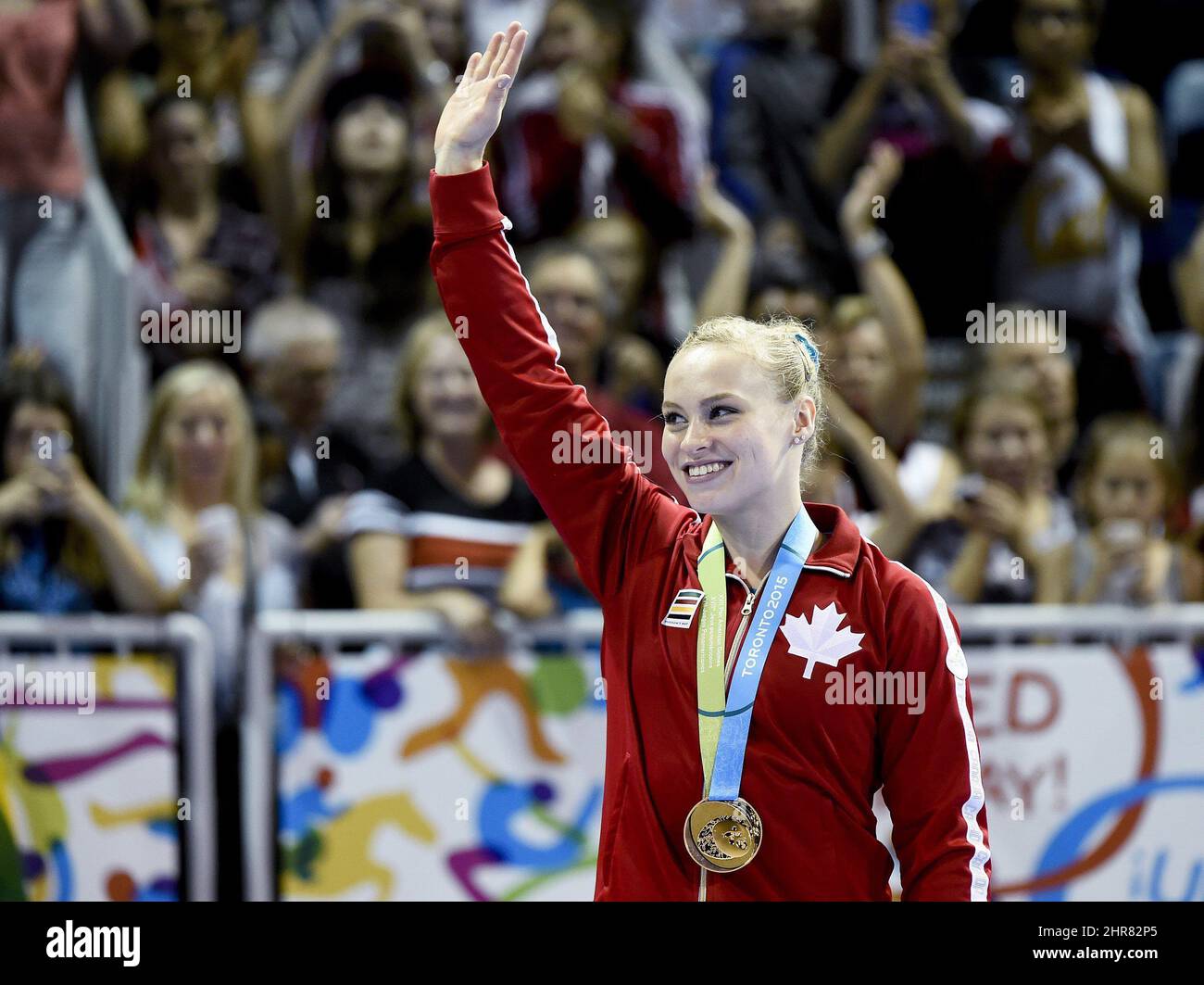 Canada's Ellie Black shows off her gold medal at the women's artistic ...