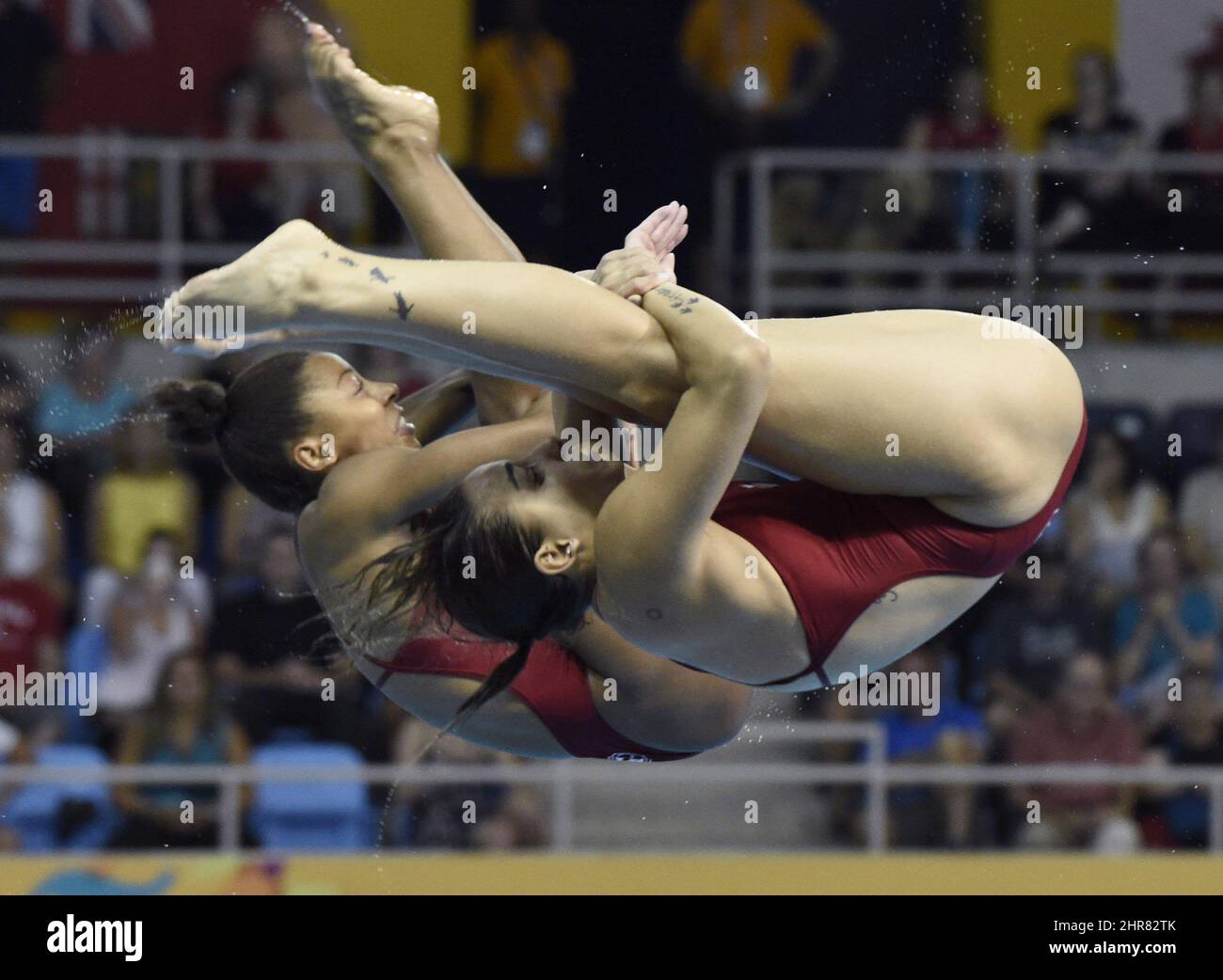 Jennifer Abel, left, and Pamela Ware perform in the three-metre ...