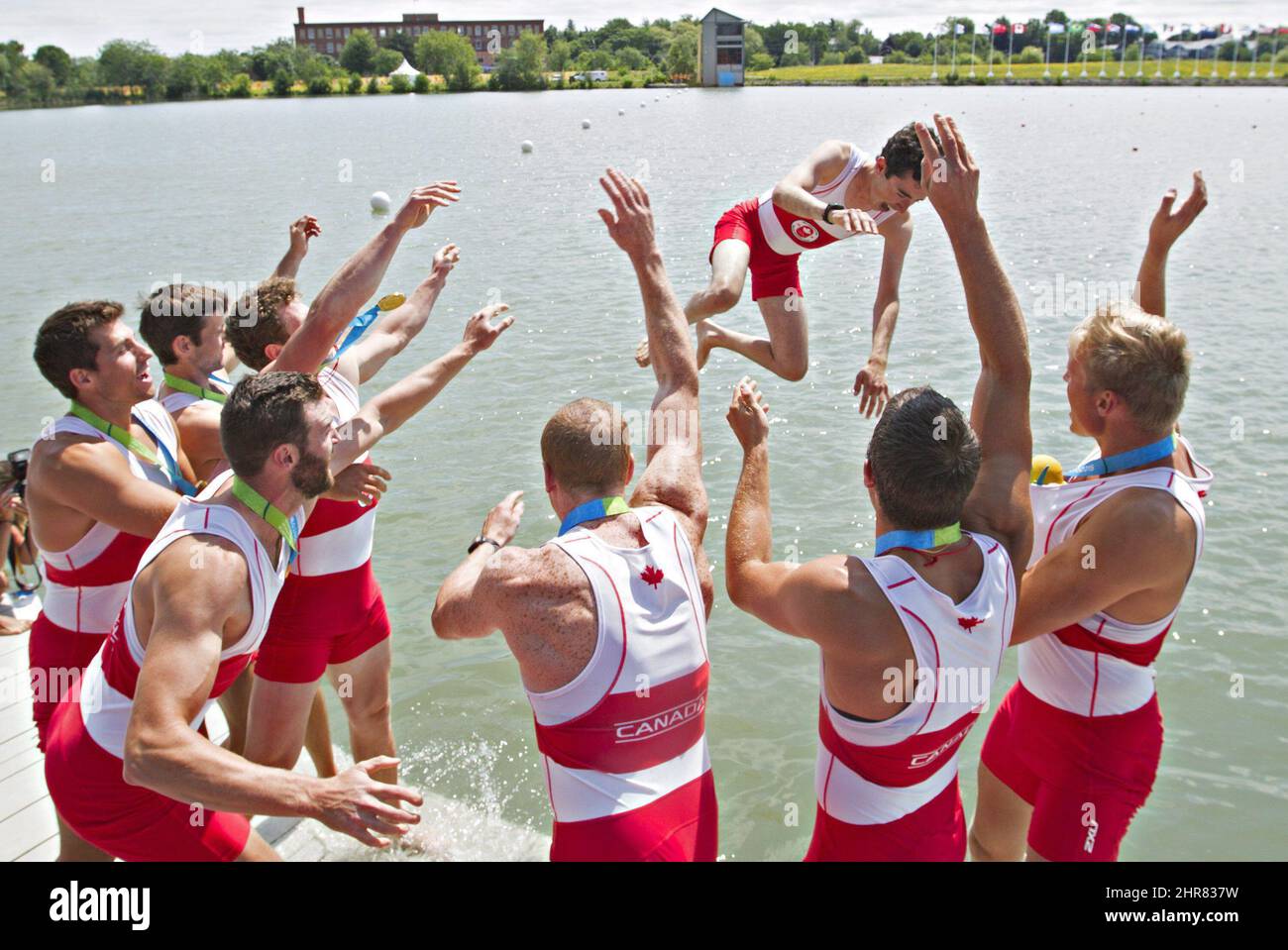 Canada's men's eight rowing team tosses coxswain Jacob Koudys into the ...