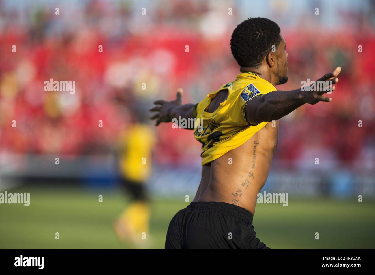 Jamaica's Gareth McCleary celebrates a goal against El Salvador during ...