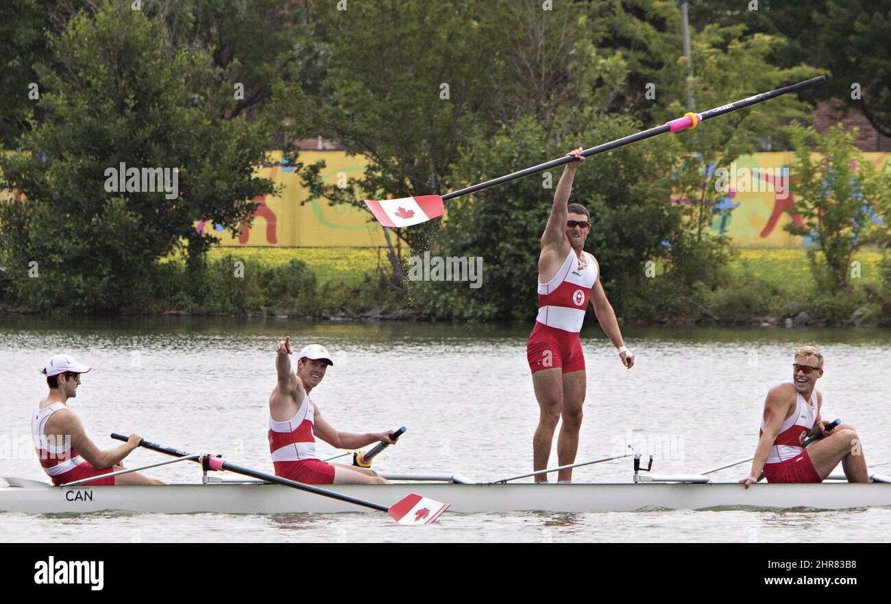 Members of Canada's men's eight rowing team, from left, Mike Evans ...