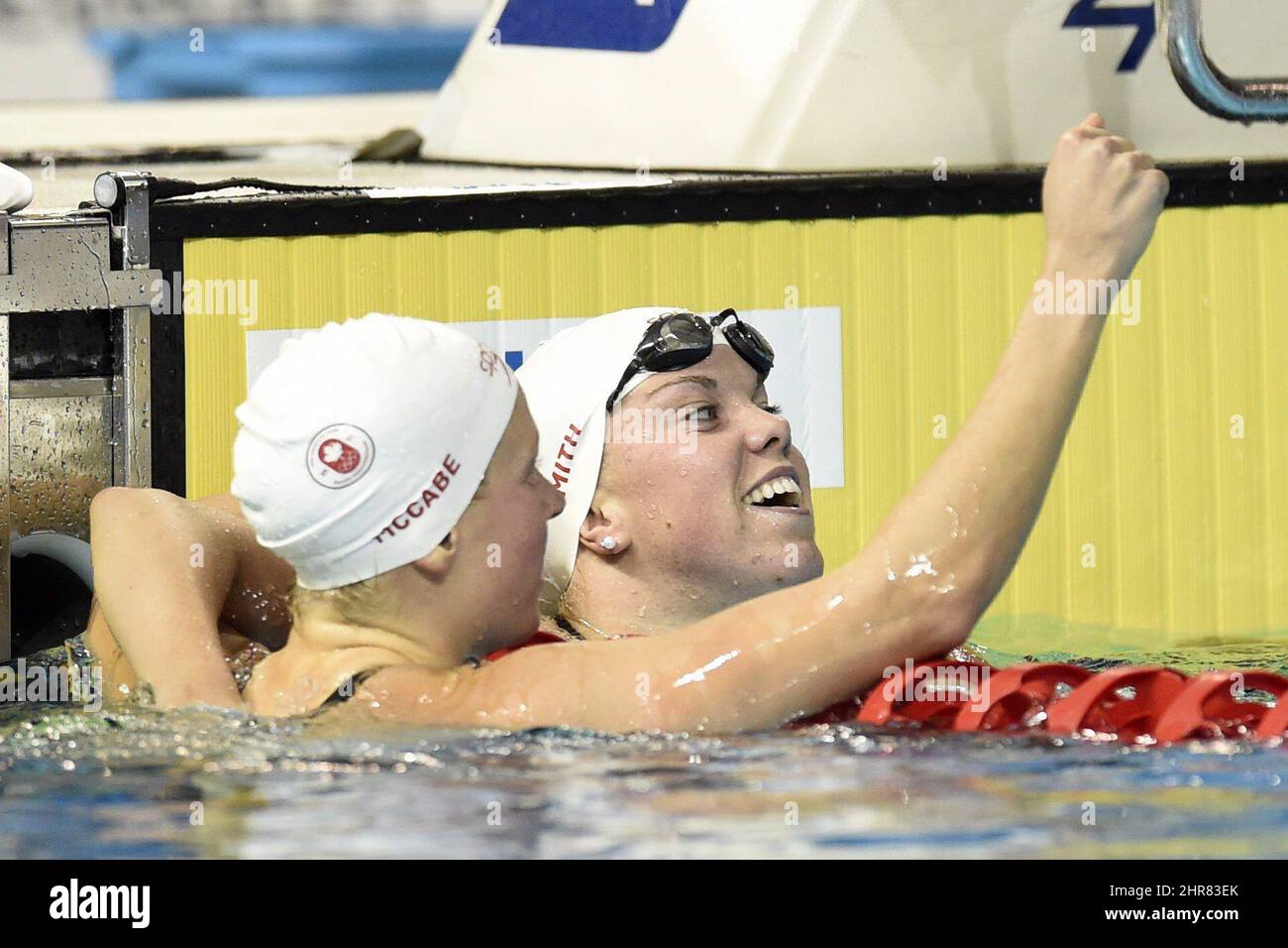 Martha McCabe and teammate Kierra Smith, of Canada, celebrate after the ...