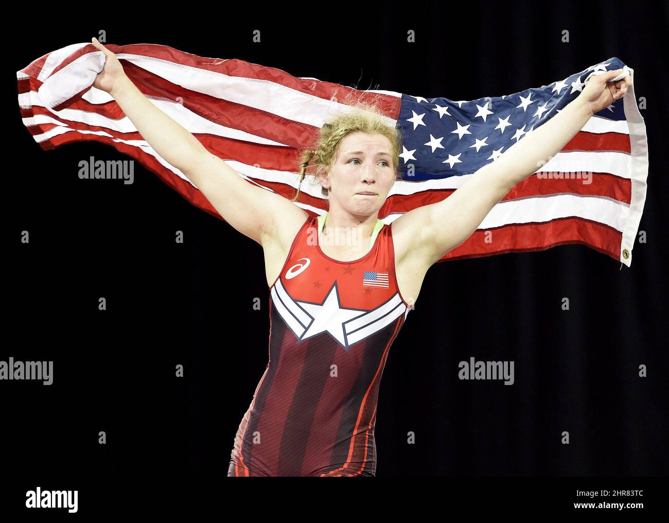Whitney Conder of the United States reacts with her county's flag after ...