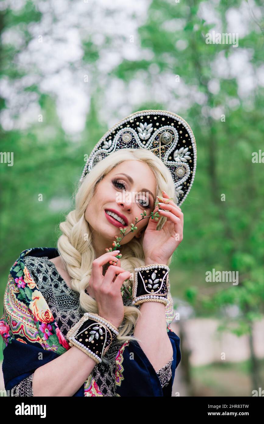 Stylish russian female in traditional national folk dress sundress and ...